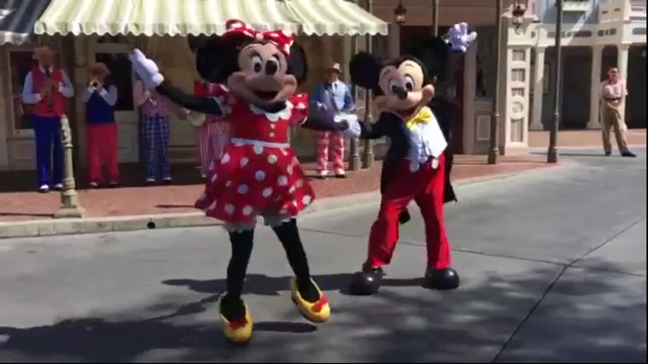Minnie Mouse and Mickey Mouse dancing video clip by Disneyland